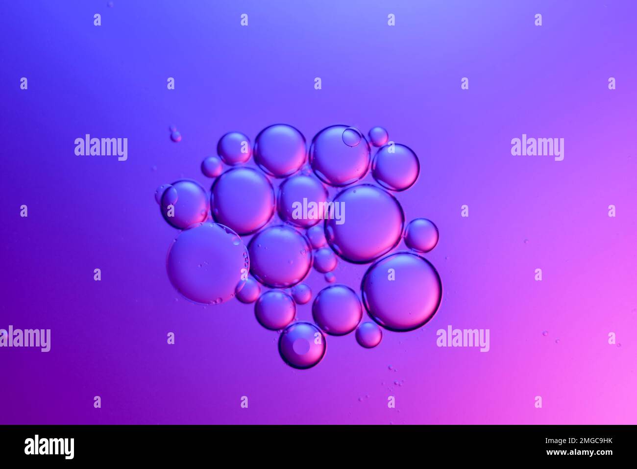 Top view movement of oil bubbles in the liquid. Oil surface ...