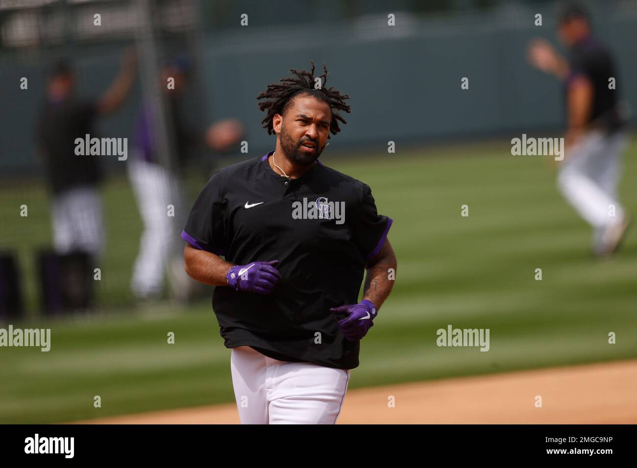 Colorado Rockies' Matt Kemp takes part in drills as the team practices ...