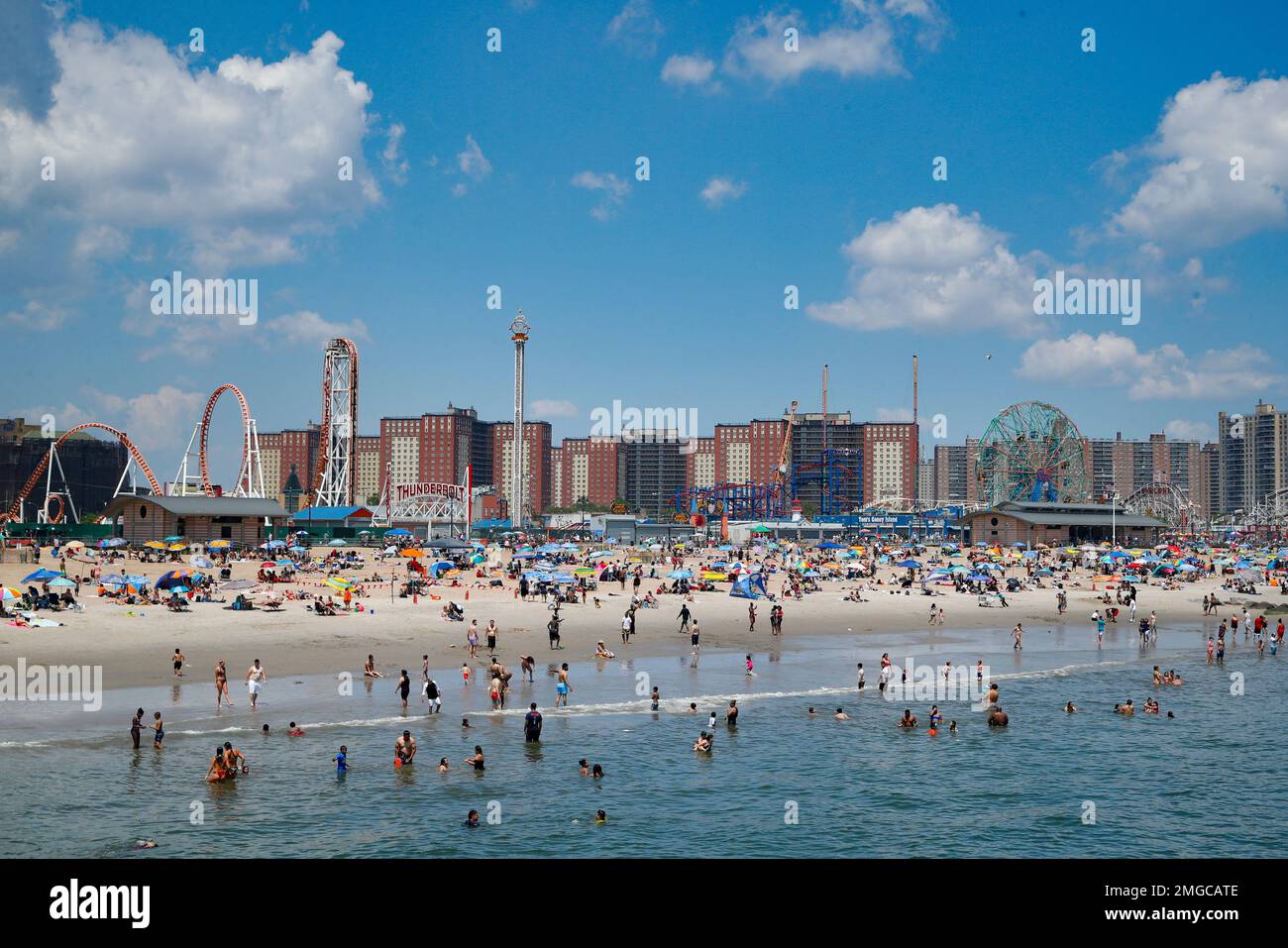 Revelers enjoy the beach at Coney Island, Saturday, July 4, 2020, in ...