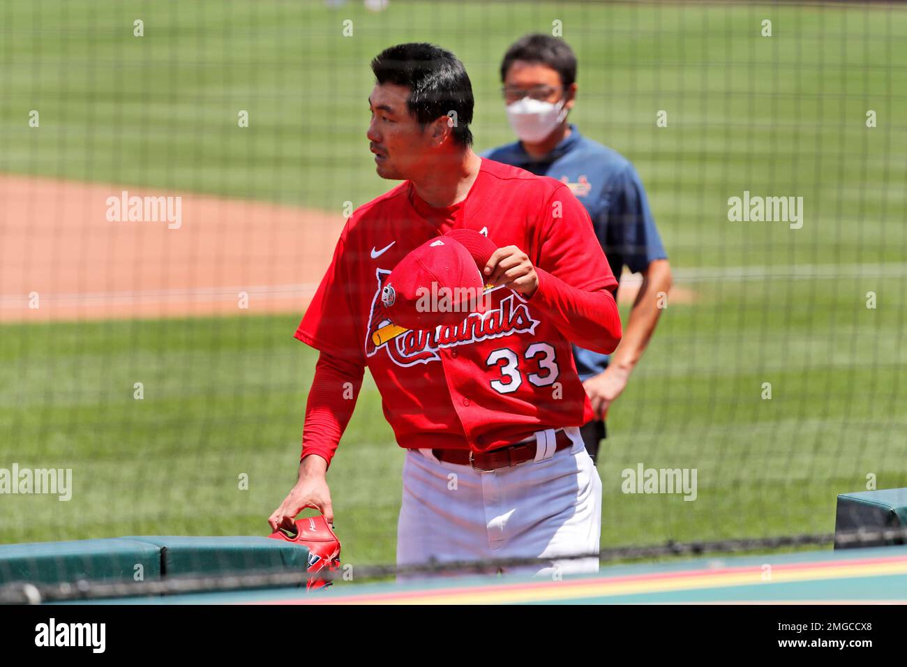St. Louis Cardinals pitcher Kwang-Hyun Kim heads to the dugout during ...