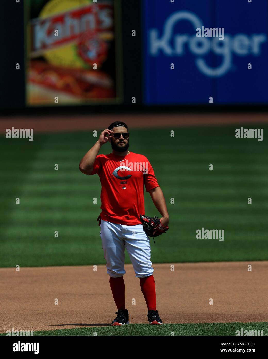 Cincinnati Reds' Eugenio Suarez (7) stands on the field during team ...