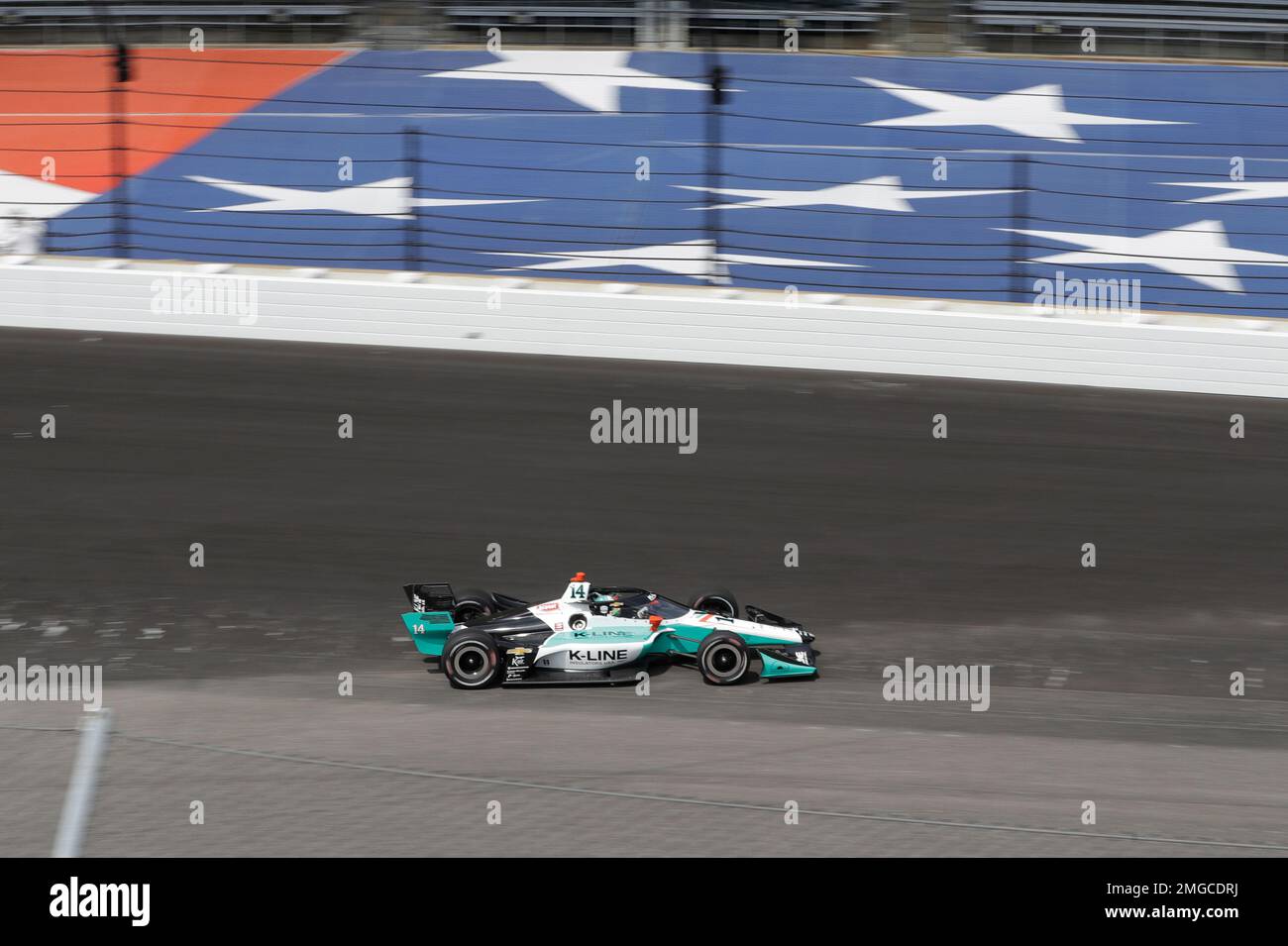 Race driver Dalton Kellett, of Canada, heads into the main straight ...