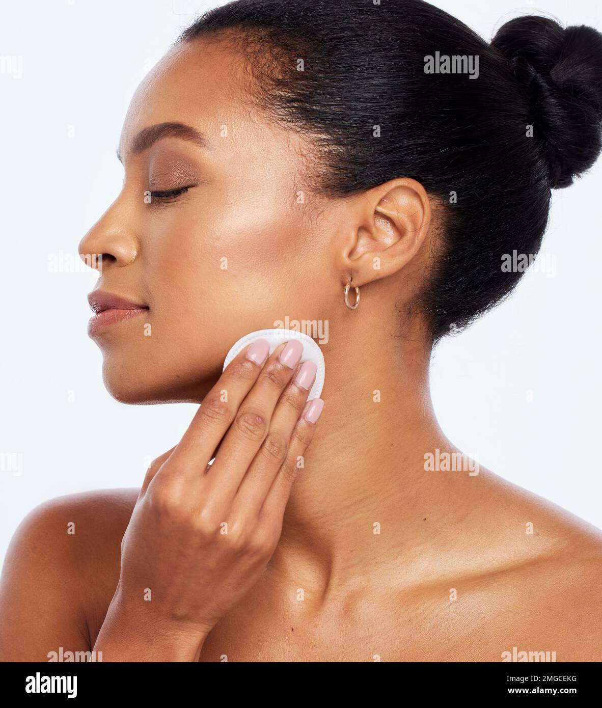 Beauty, skincare and cotton for face cleaning in studio with ...