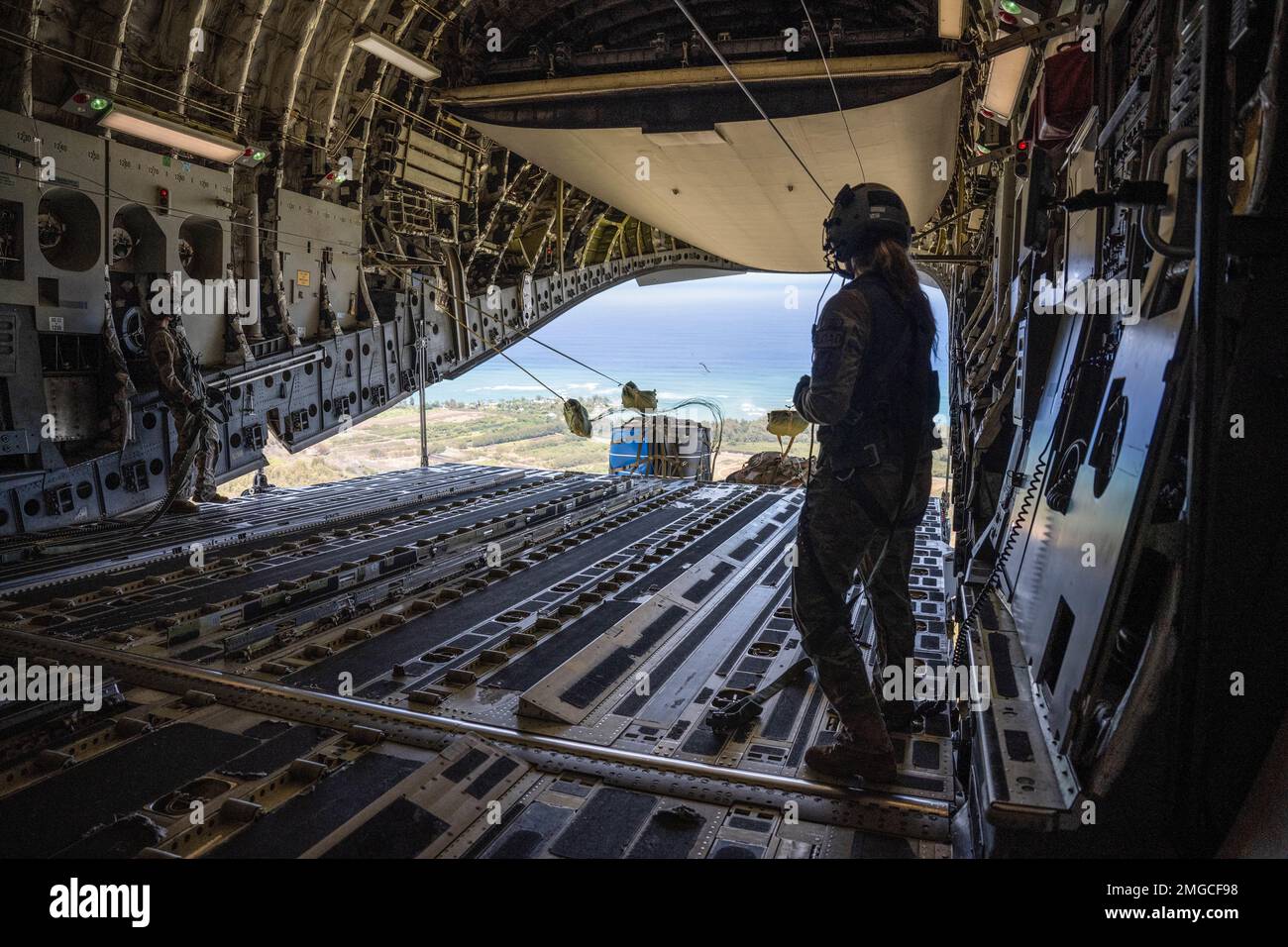 Senior Airman Jolan Besse and Staff Sgt. Georgeanne Heck, 535th Airlift ...