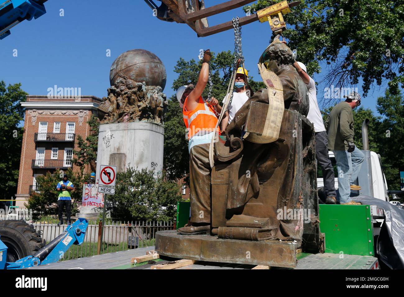 EDS NOTE: OBSCENITY - Workers remove the statue of Confederate Naval ...