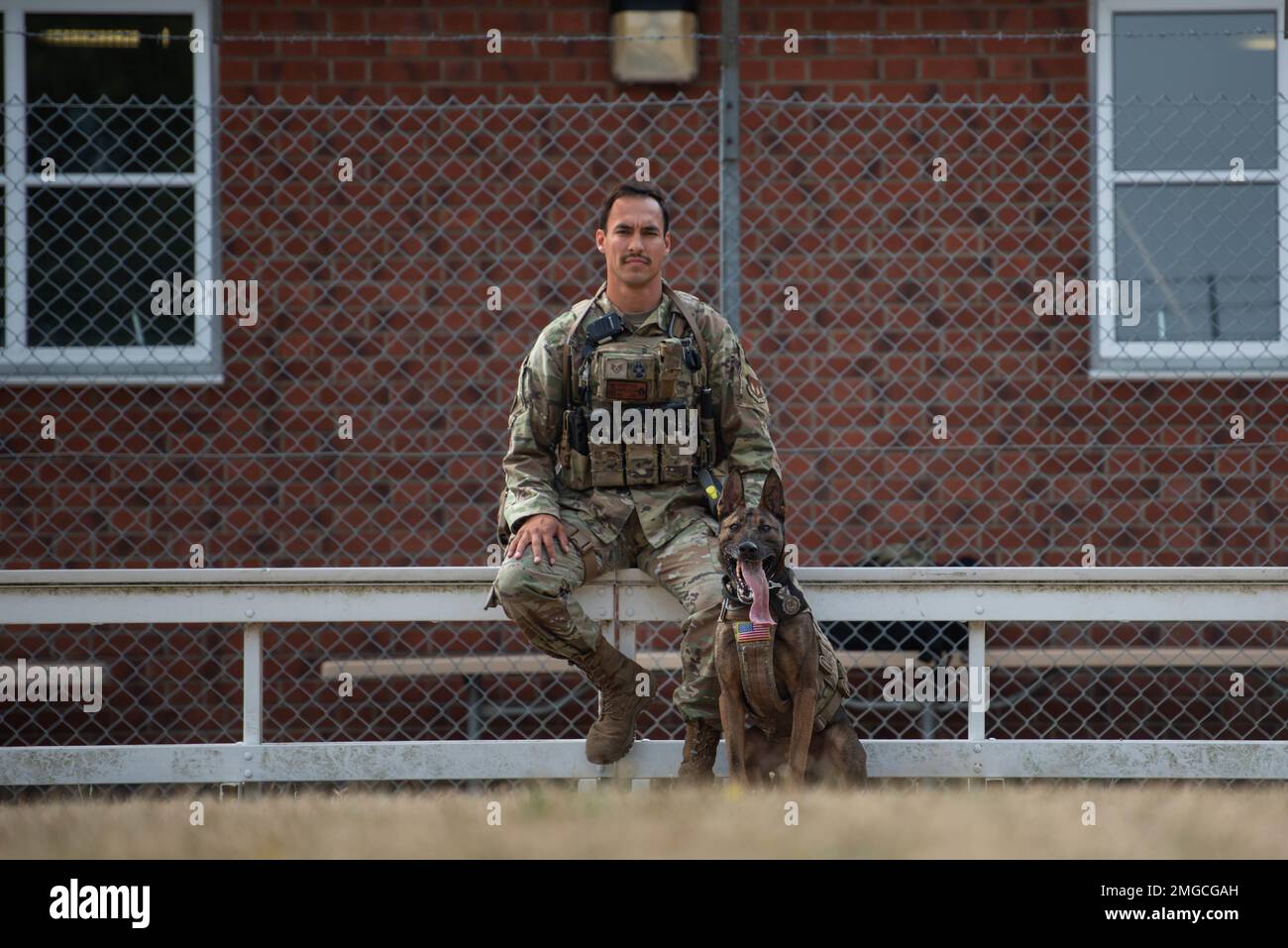 U.S. Air Force Staff Sgt. Dylan White, military working dog handler ...