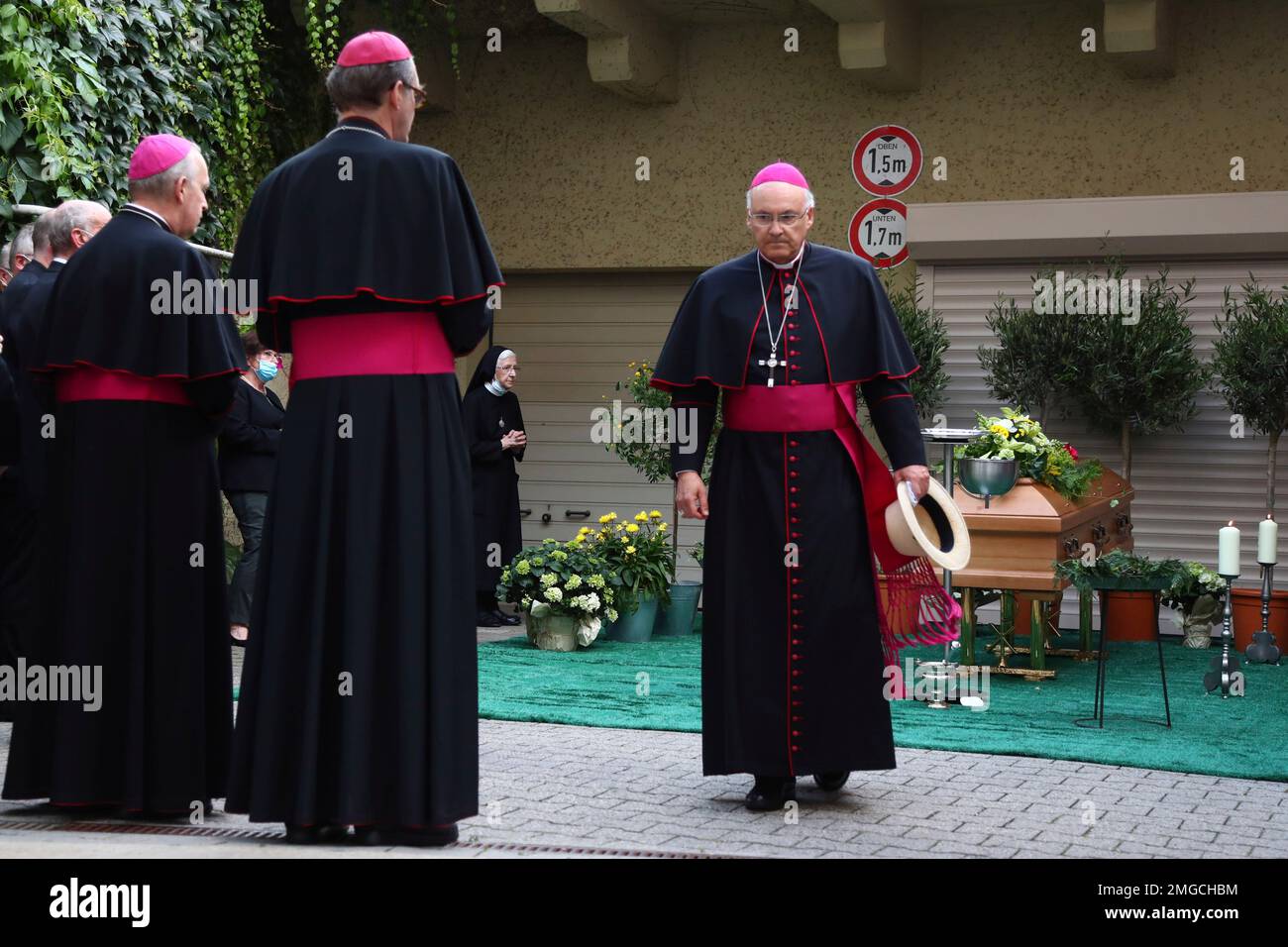 Rudolf Voderholzer, bishop of Regensburg, arrives at the coffin of ...