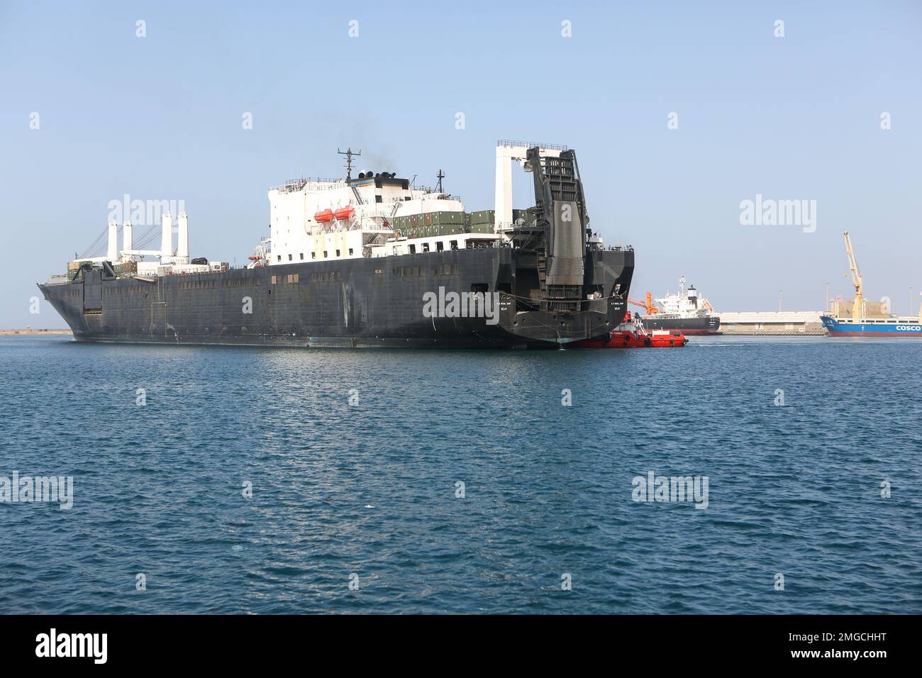 US. Naval Ship Seay (T–AKR-302) is pushed by Yanbu Commercial Port ...