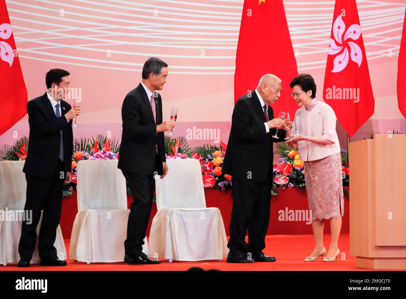 Hong Kong's Chief Executive Carrie Lam, right, toasts with former Chief ...