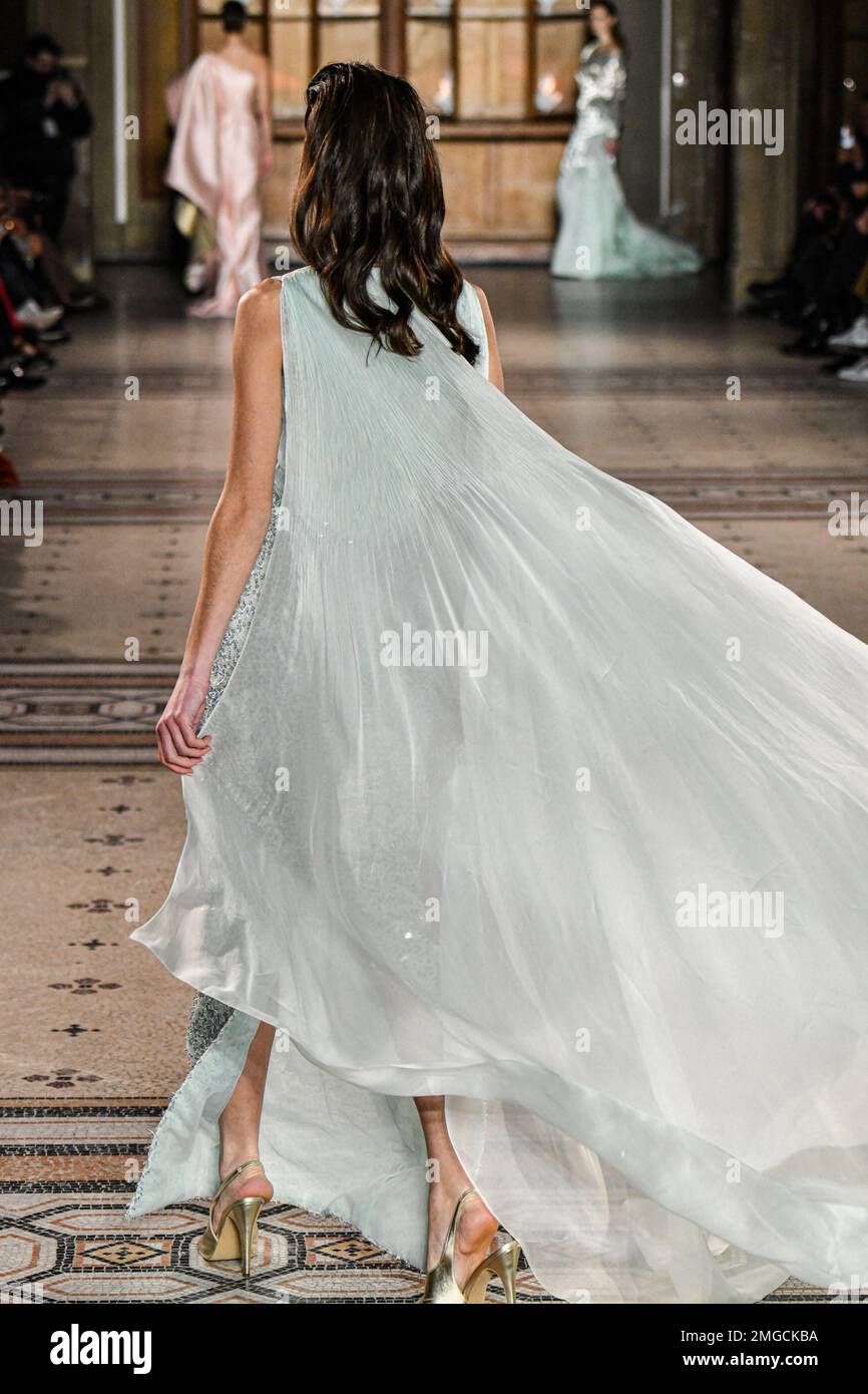 Paris, France. 25th Jan, 2023. A model walks the runway at the Rami Al ...