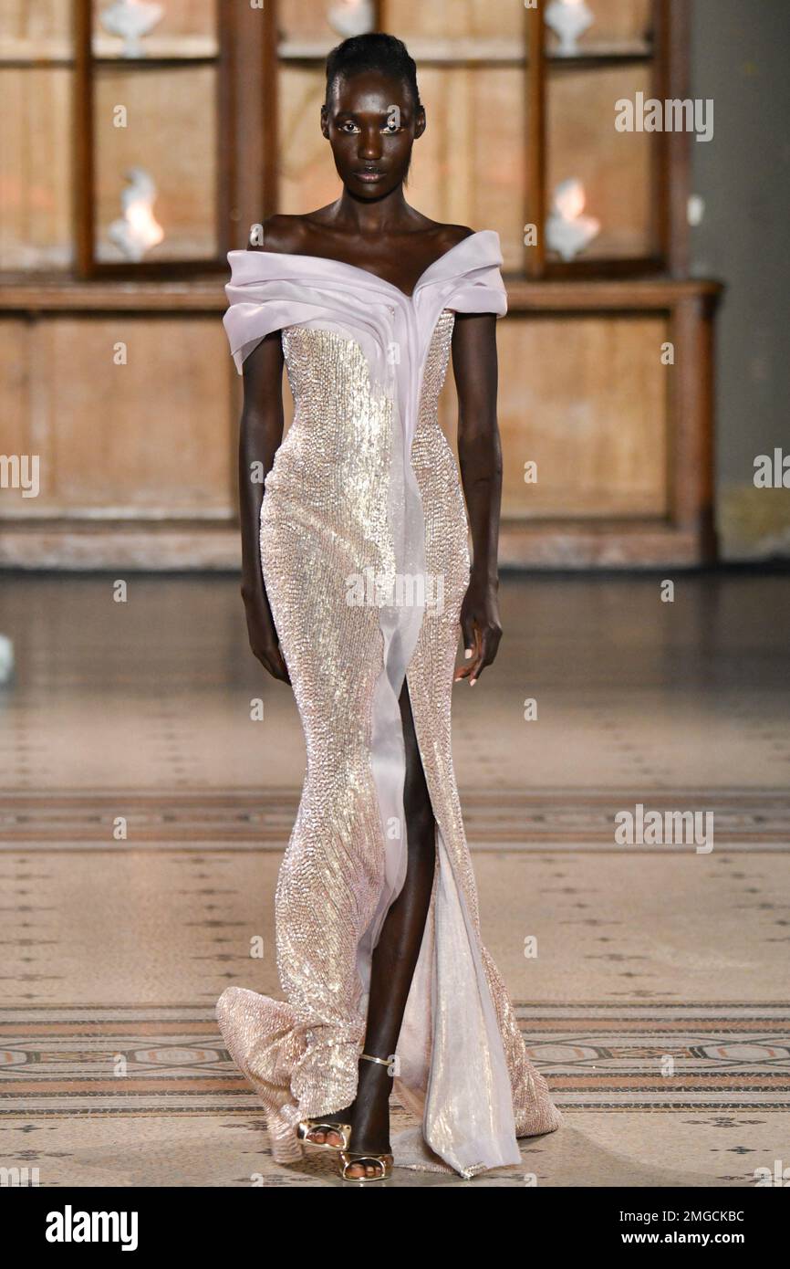 Paris, France. 25th Jan, 2023. A model walks the runway at the Rami Al ...