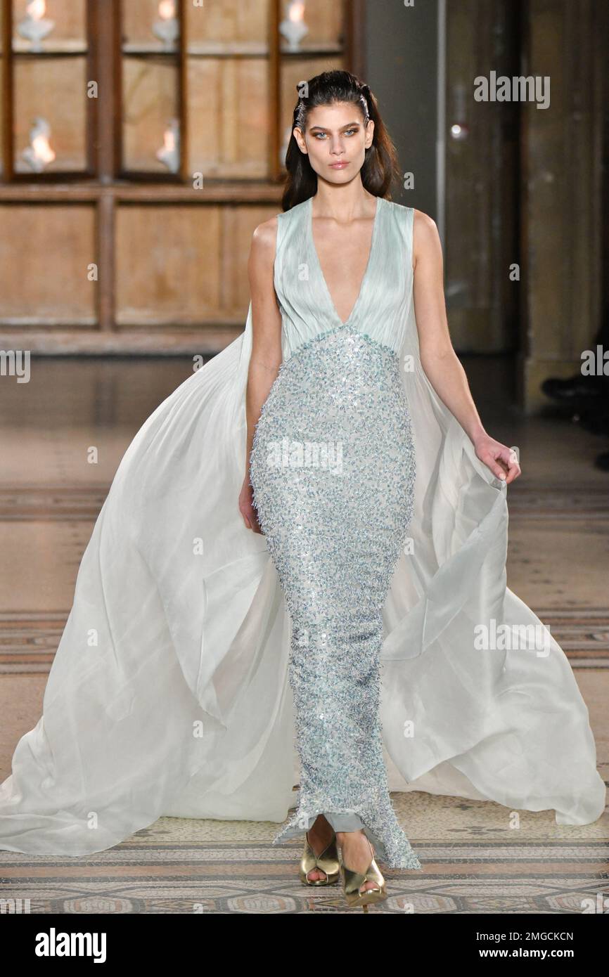 Paris, France. 25th Jan, 2023. A model walks the runway at the Rami Al ...