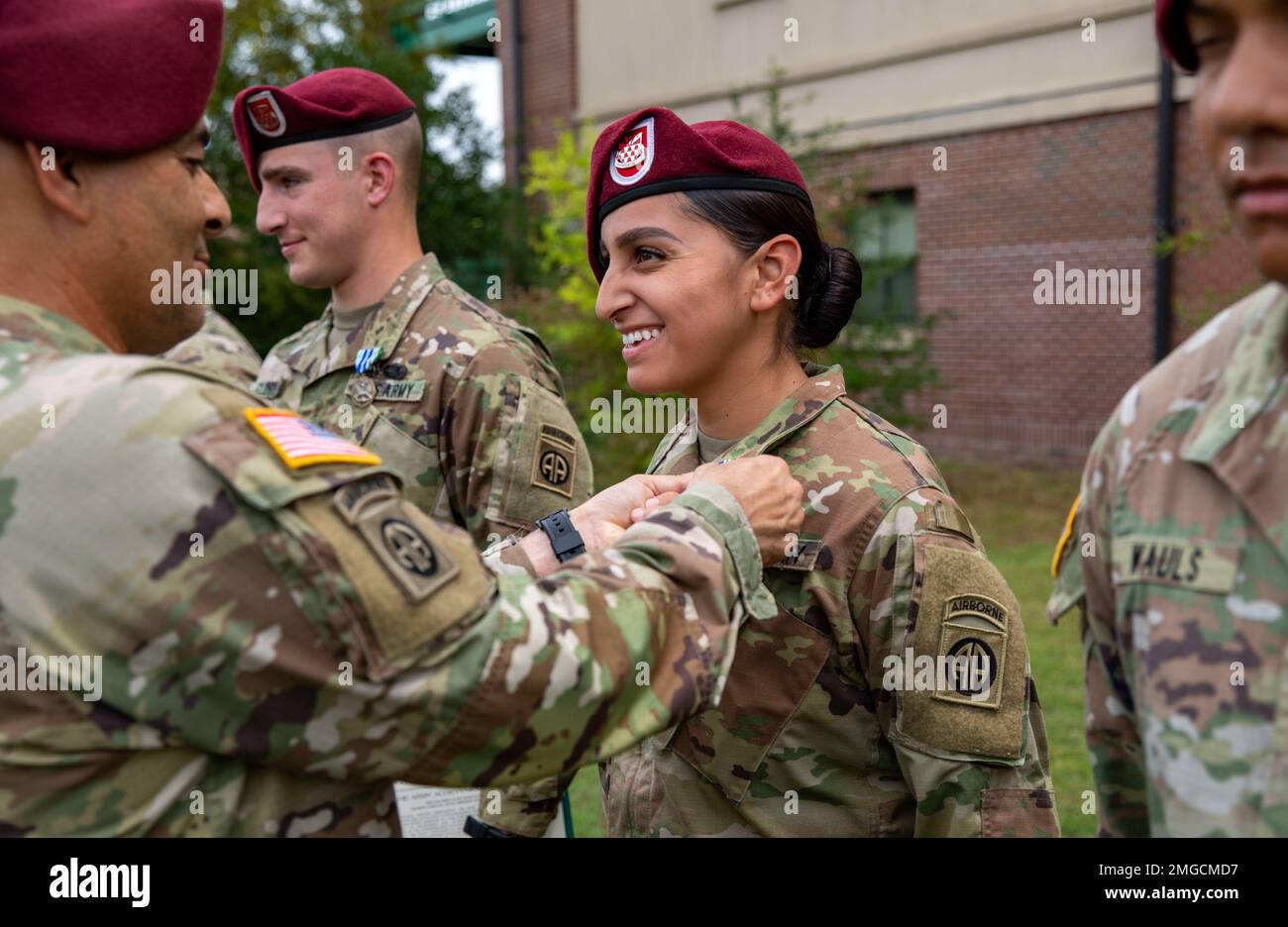 Pfc. Alexis R. Banks, receives the Army Achievement Medal from Lt. Col ...