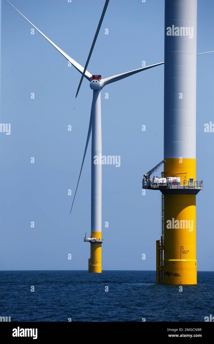 Two of the offshore wind turbines have been constructed off the coast ...