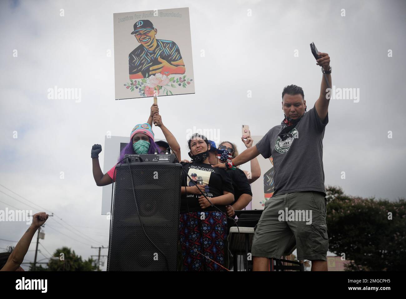 Jennifer Guardado, center, sister of Andres Guardado cries as she ...