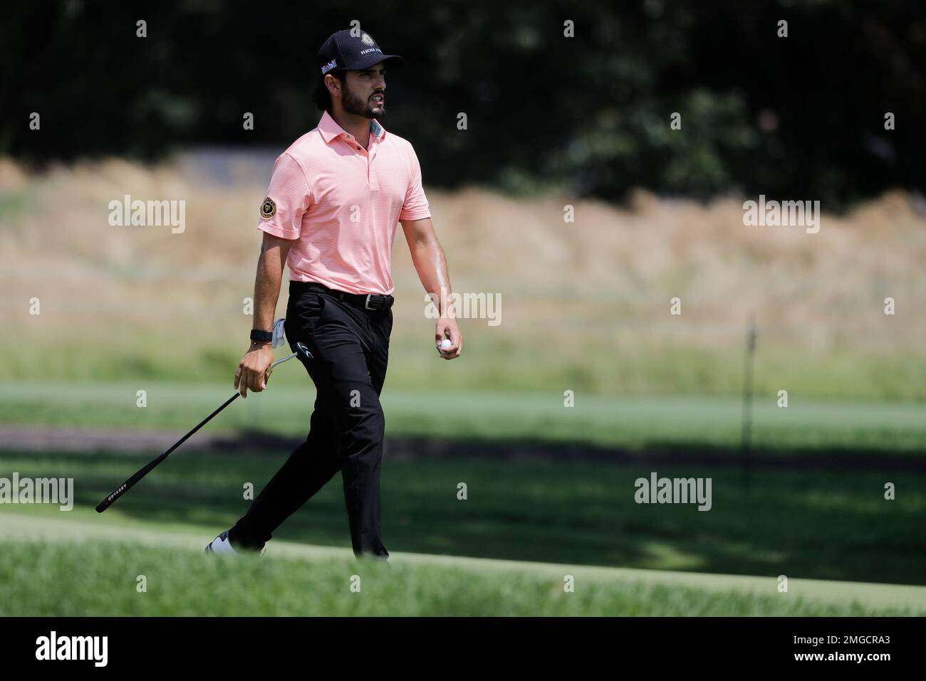 Abraham Ancer, of Mexico, walks to the fifth tee box during the final ...