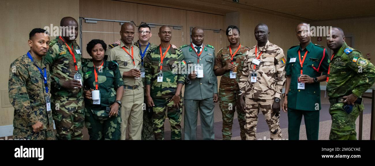 African partners take a photo together to mark their attendance at the ...