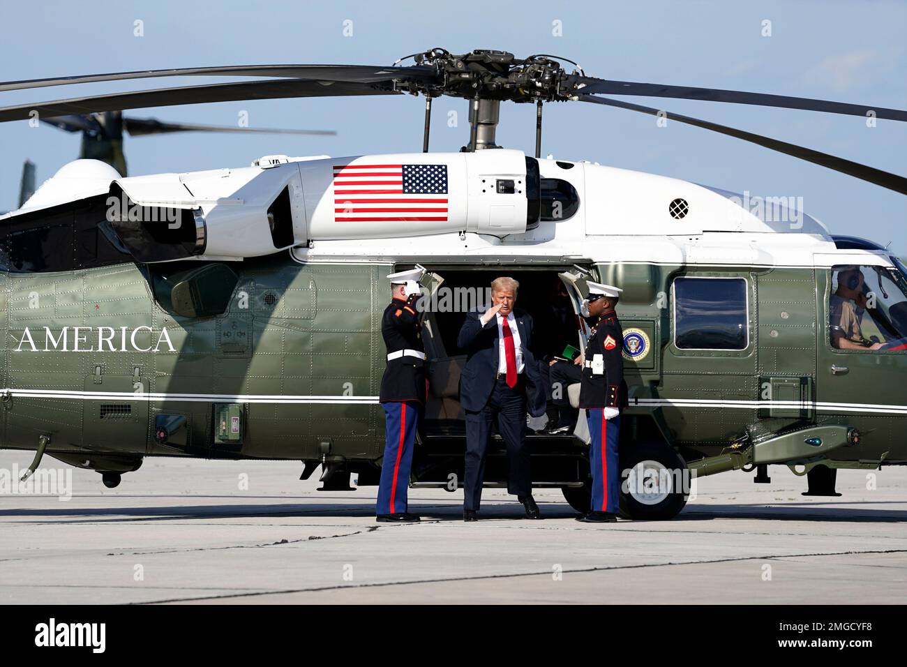President Donald Trump arrives on Marine One to board Air Force One to ...