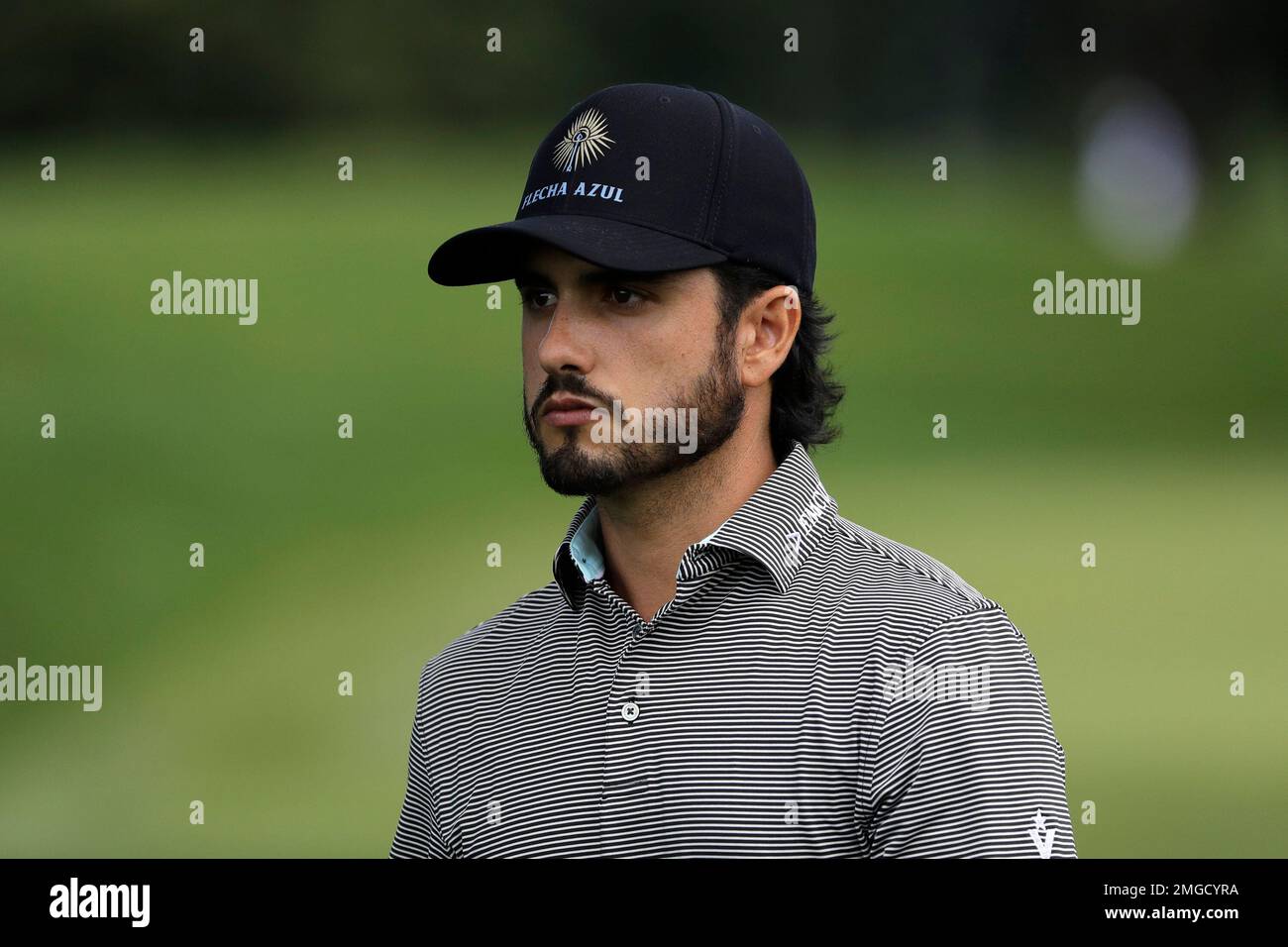 Abraham Ancer, of Mexico, walks toward the third green during the first ...