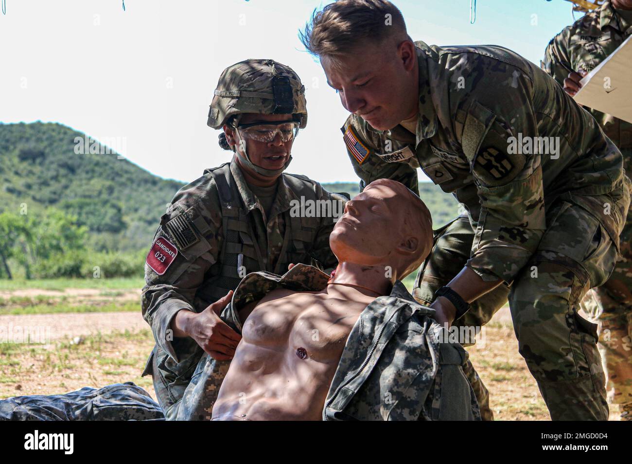 Sgt. 1st Class Renae Alvarado, left, a combat medic assigned to 2nd ...