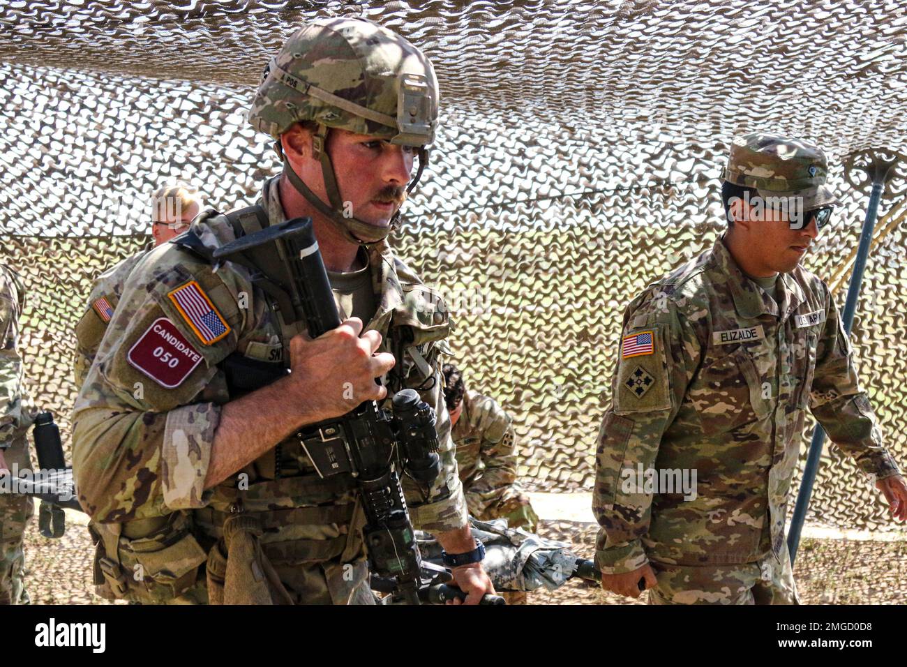 Spc. Joel Snyder, a combat medic assigned to 52nd Brigade Engineer ...