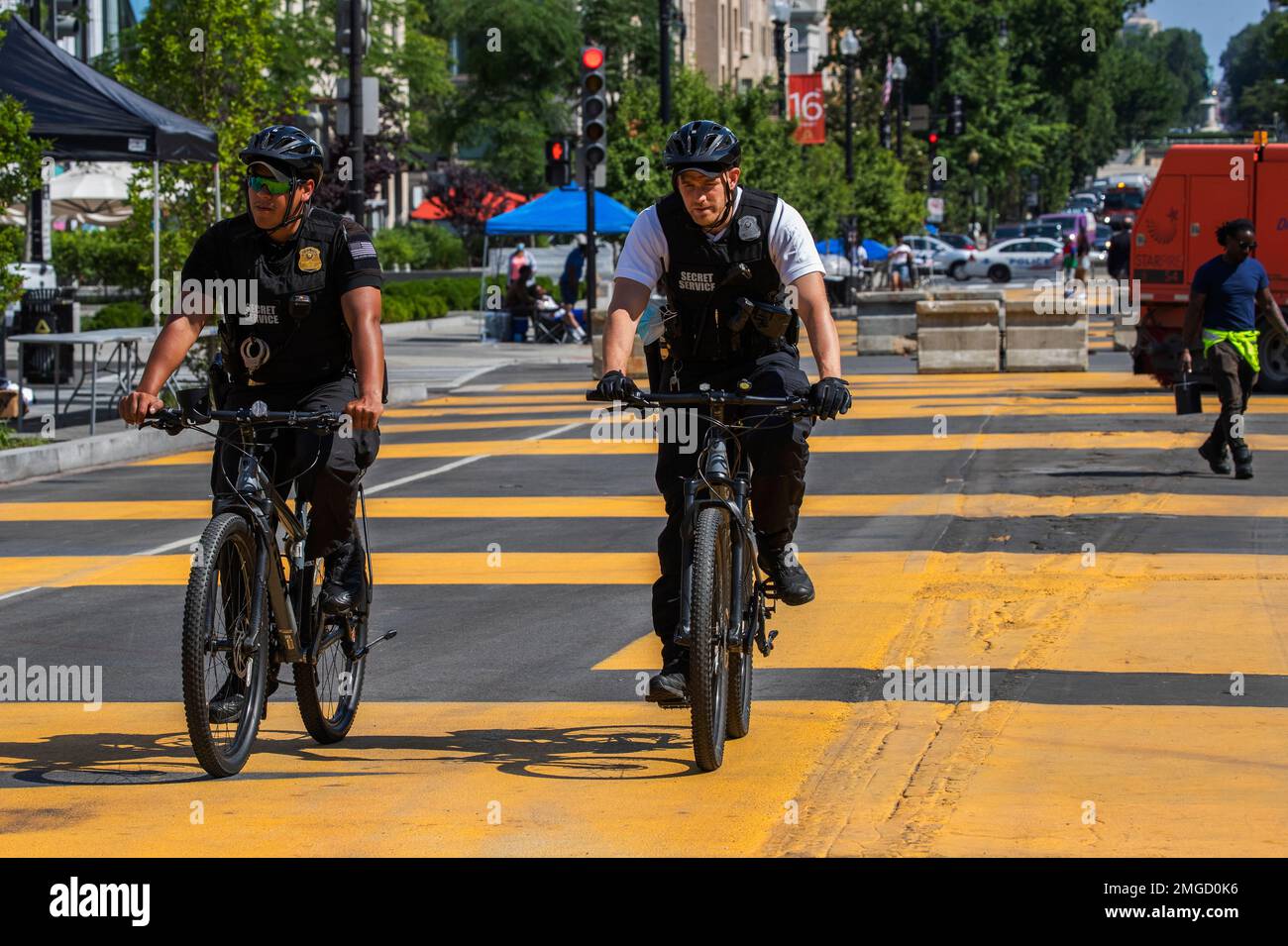 Uniformed Secret Service Police officers ride their bikes on the ...