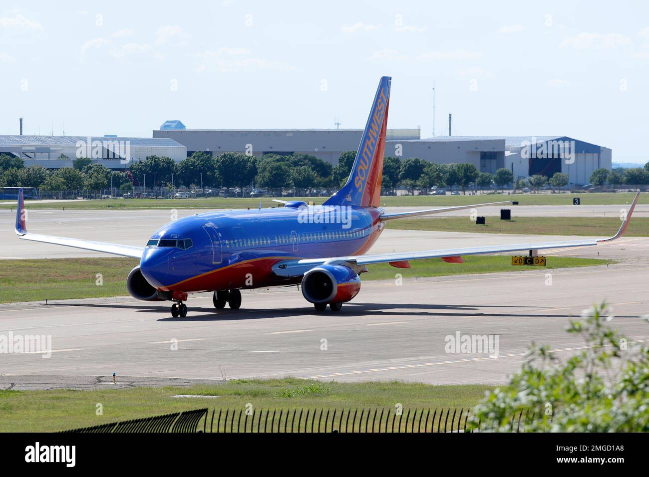 A Southwest Airlines jet taxis before taking off from Love Field in ...
