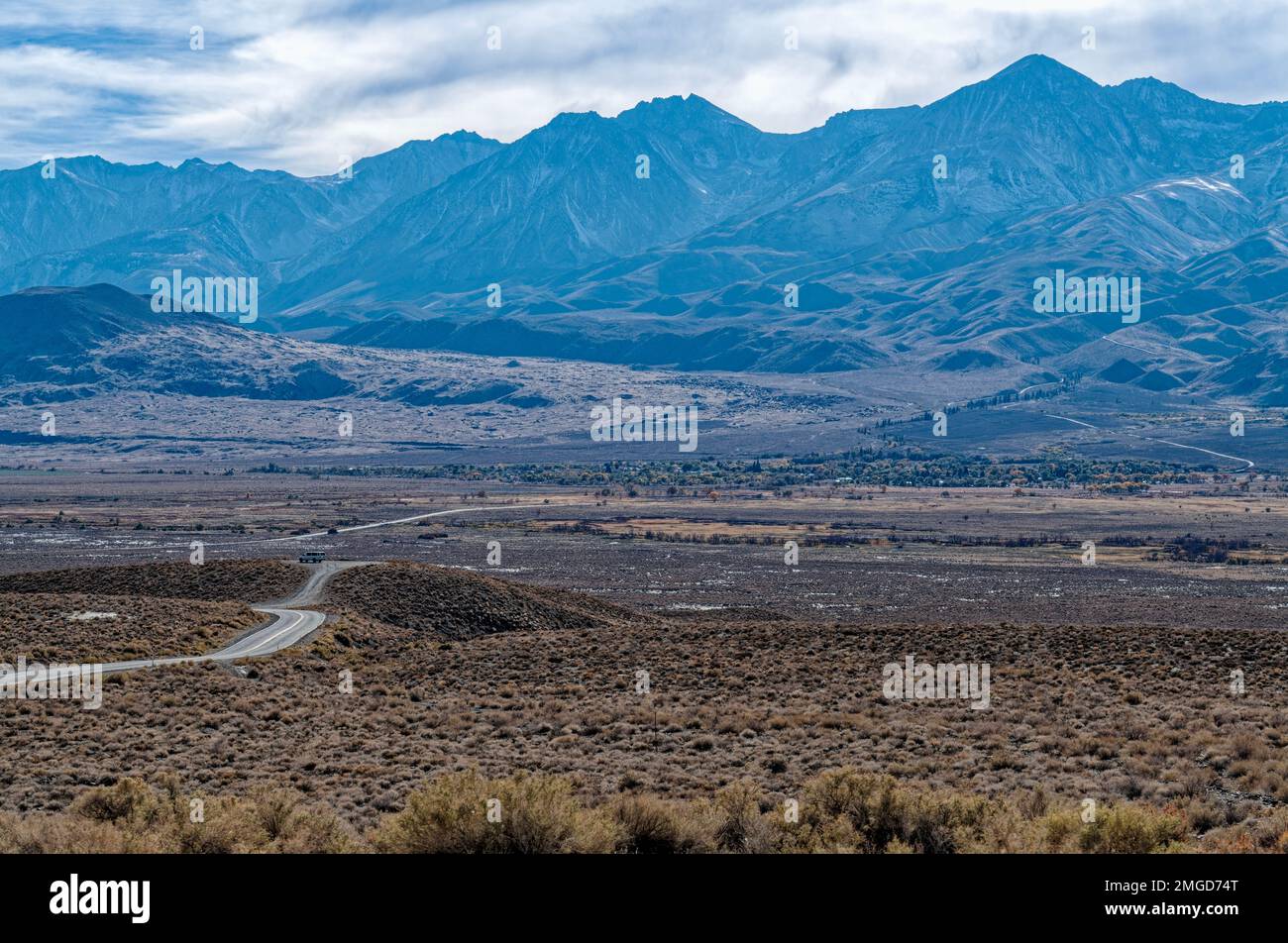 Highway 168 descends from the east into Big Pine in California, USA ...