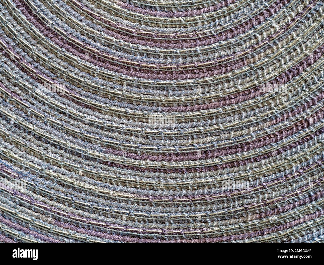 Section of the circular patterns of a woven fabric placemat Stock Photo ...