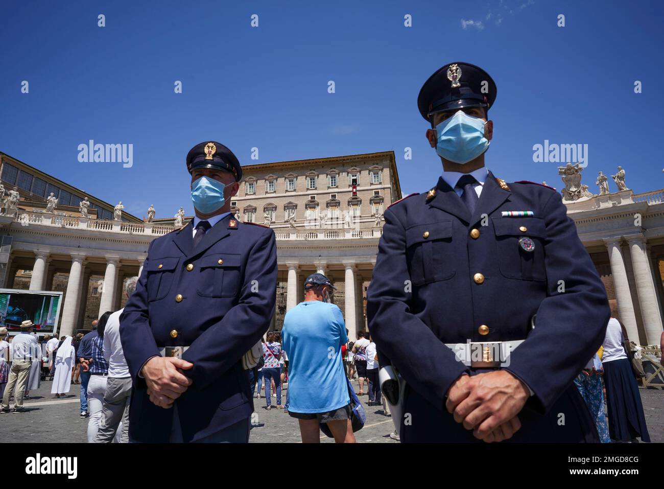 Police officers patrol the square as Pope Francis delivers his blessing ...