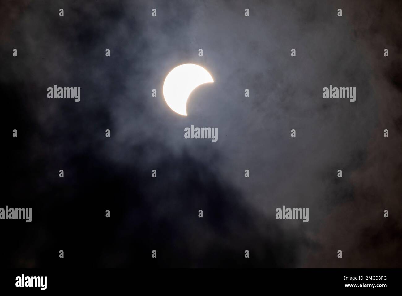 A partial solar eclipse is seen in Hefer Valley, Israel, Sunday, June ...