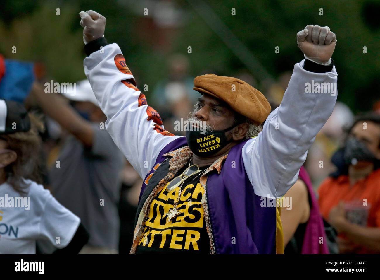People listen to a speaker at a Juneteenth rally in Tulsa, Okla ...