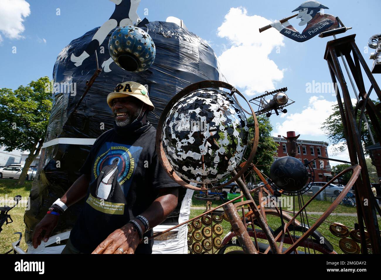 Darren Wells stands on his float during a Juneteenth celebration ...