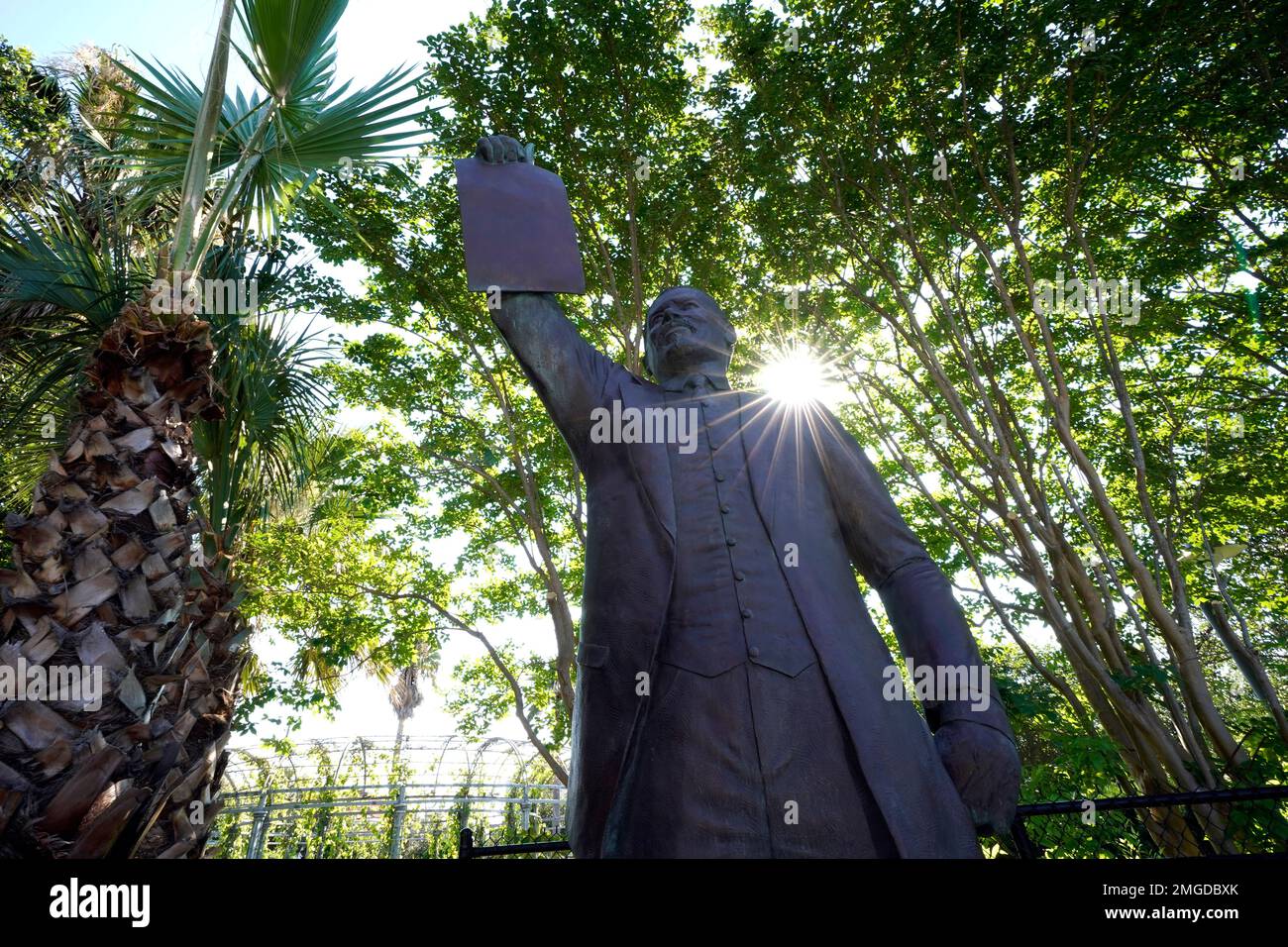 A statue depicts a man holding the state law that made Juneteenth a ...