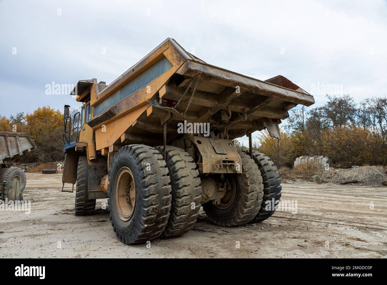Large mining dump truck. Transport industry. Extraction of stone in an ...