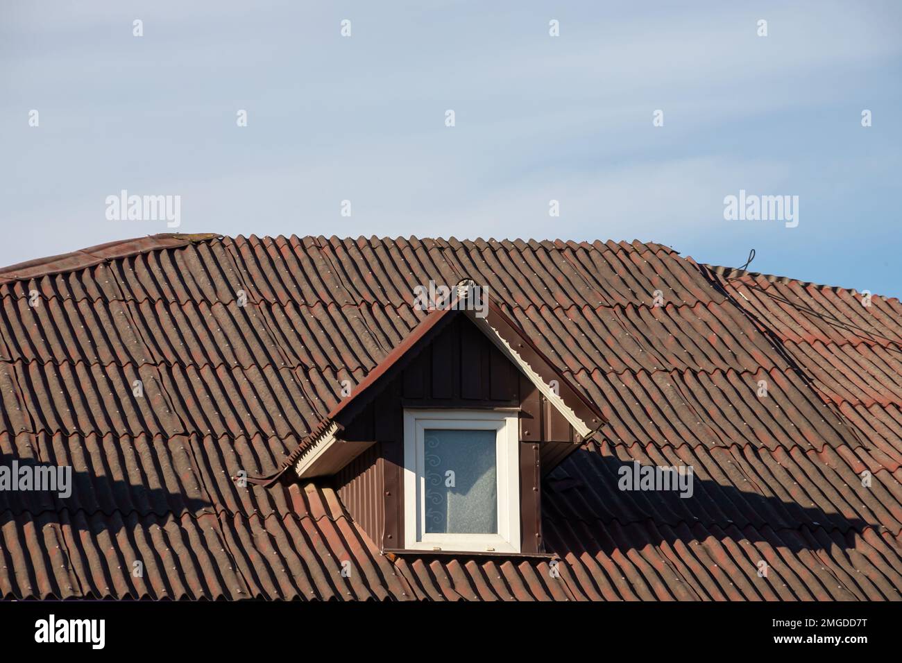 New roofing construction with attic skylights, rain gutter system, roof ...