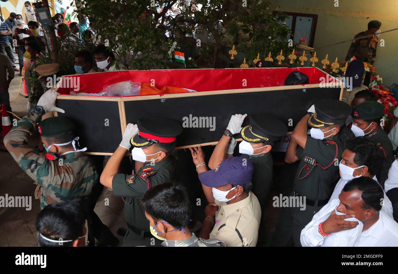 Indian army officers carry the coffin of Colonel B. Santosh Babu for ...