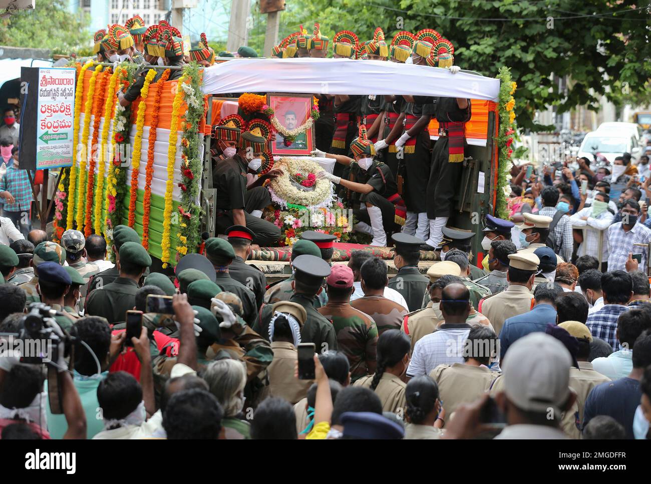 A truck carrying the coffin of Indian army officer Colonel B. Santosh ...