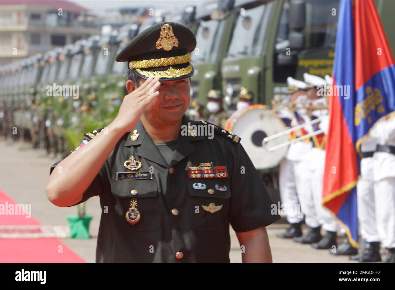 Son of Cambodian Prime Minister Hun Sen, Lt. Gen. Hun Manet inspect the ...