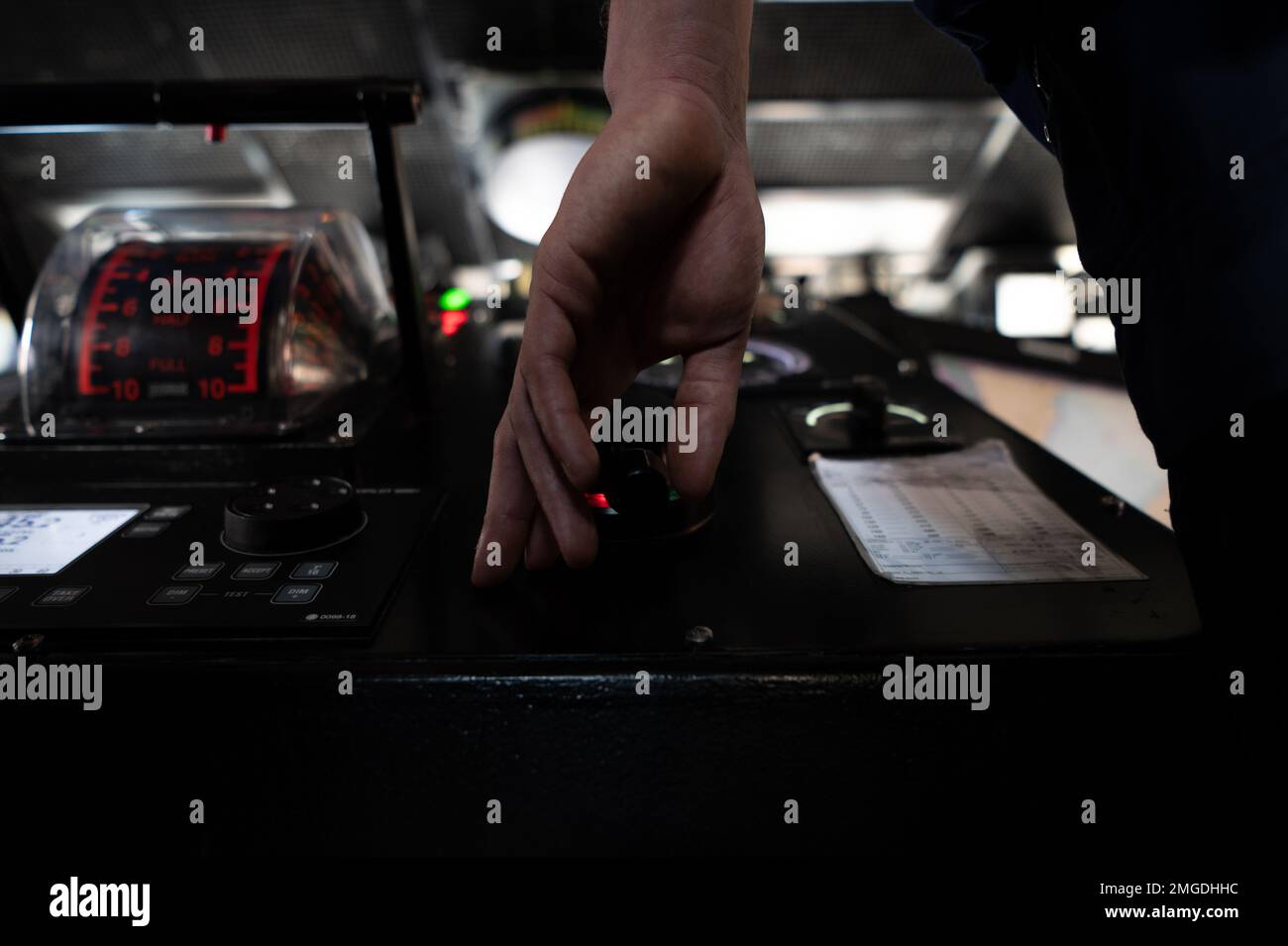 A detail shot shows the hand of U.S. Coast Guard Seaman Jacob Craig, a ...