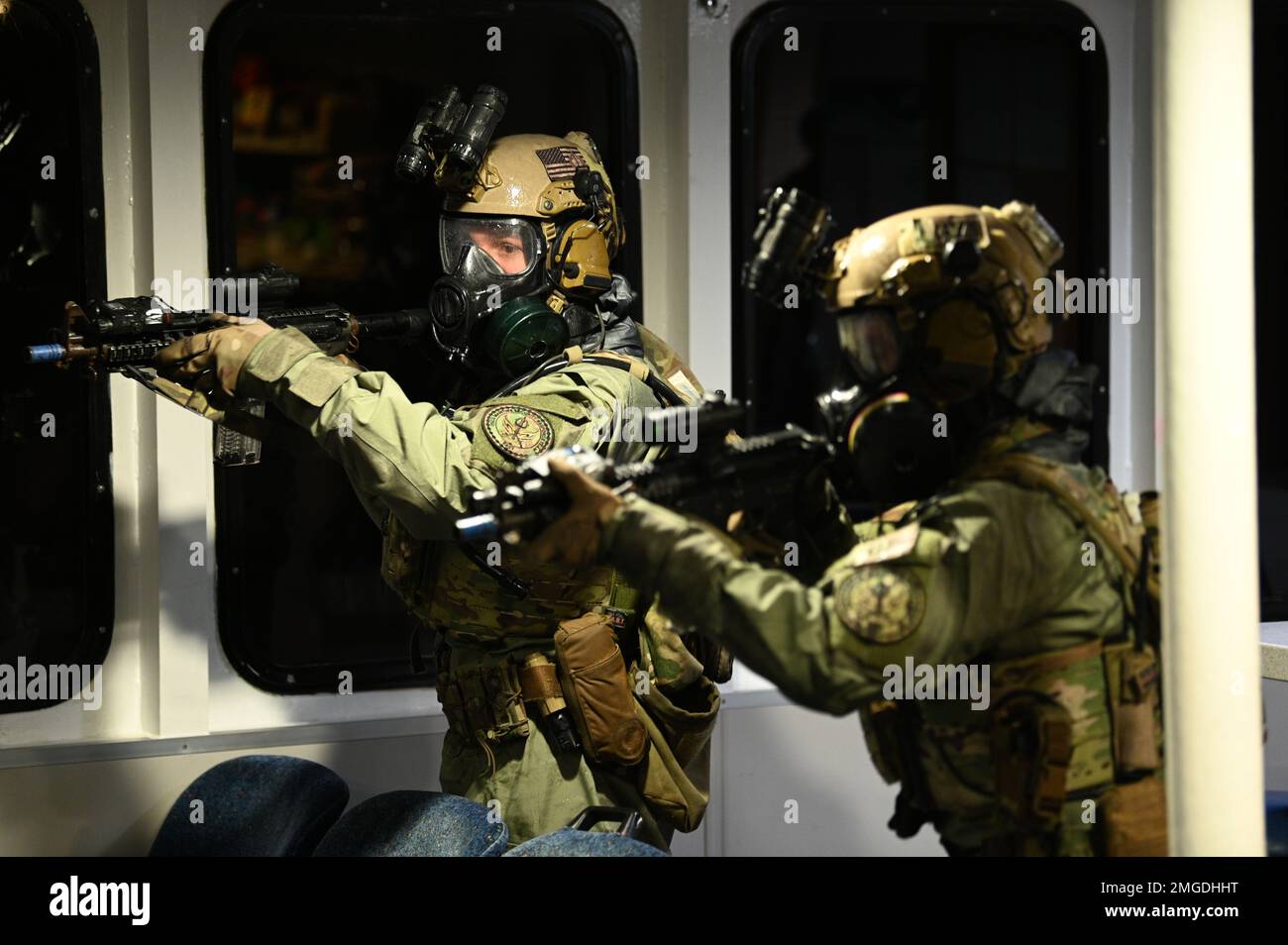 Two members from the Coast Guard Maritime Security Response Team East ...