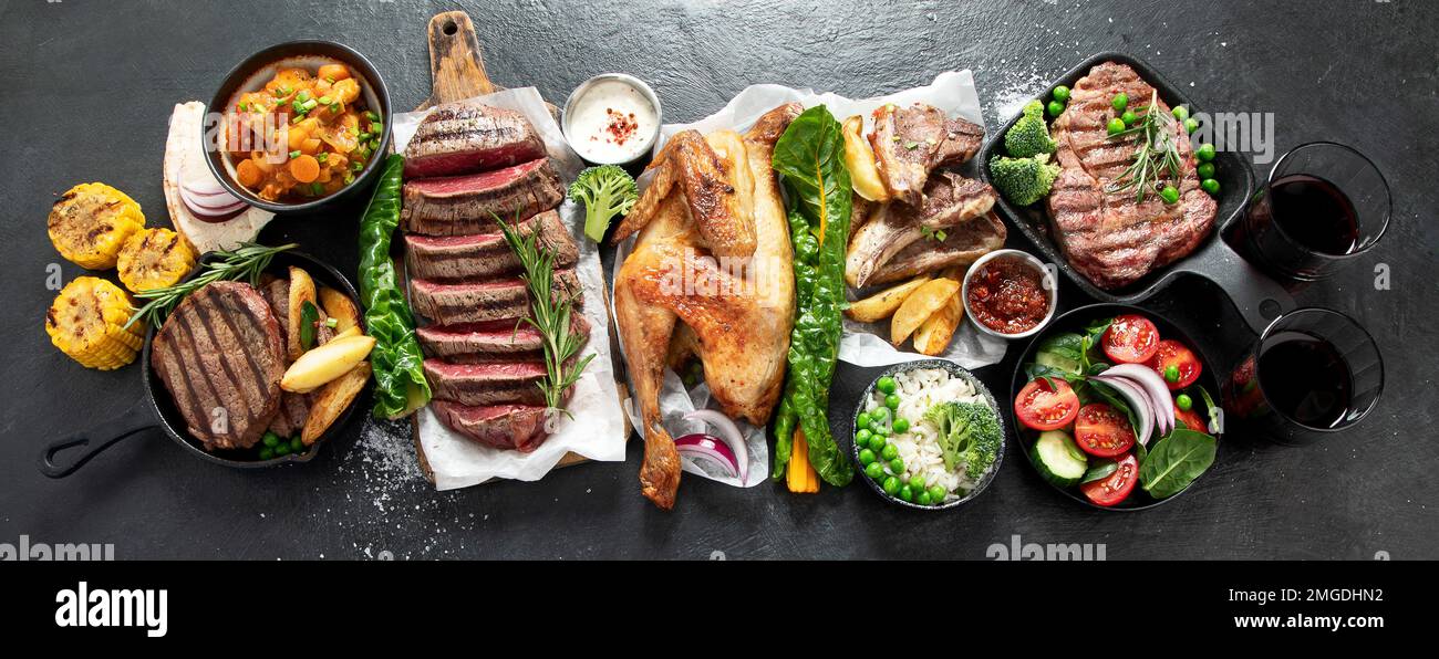 Various types of healthy cooked meat - beef, pork, chicken on a dark ...