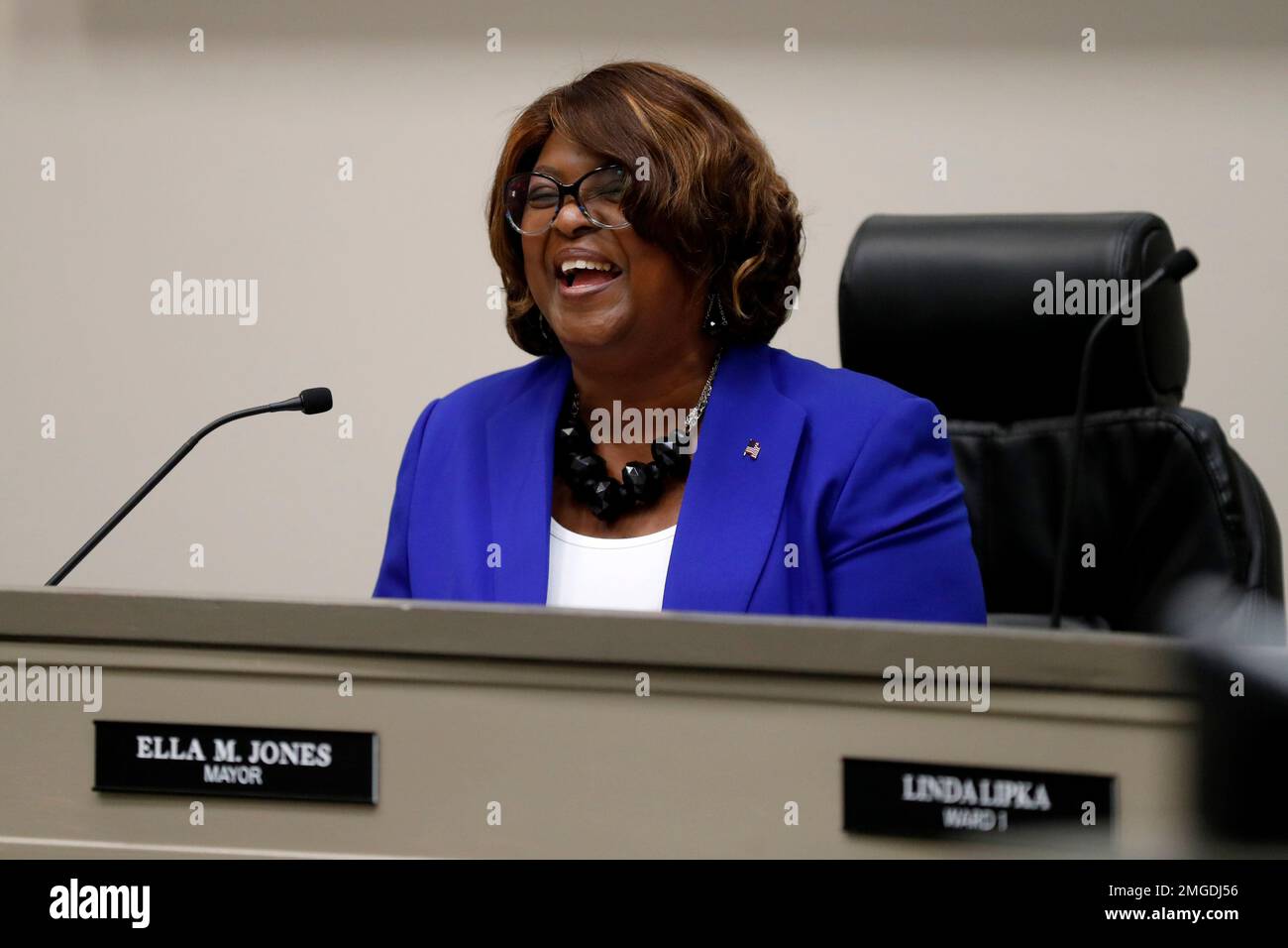 Ella Jones smiles as she takes her seat after being sworn in as mayor ...
