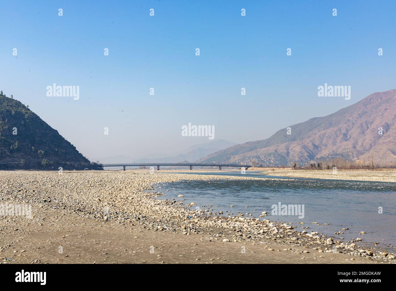 Beautiful scenery of a river and steel bridge in swat valley, Pakistan ...
