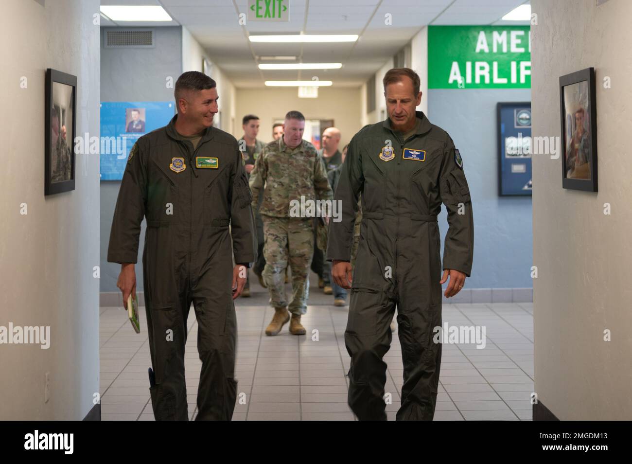 U.S. Air Force Col. David Fazenbaker, left, 62d Airlift Wing commander ...