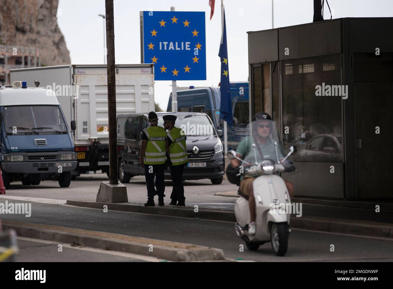 A man on a scooter crosses into France at the Saint-Ludovic border ...