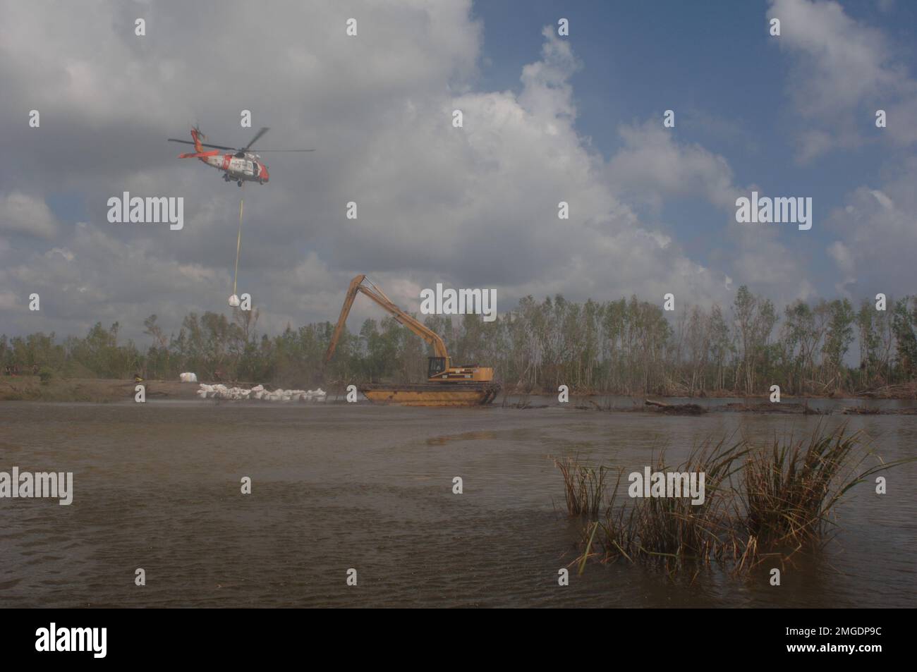 Aircrafts - Sand Baggers - 26-HK-57-74. HH-60 with sand bag flying over ...