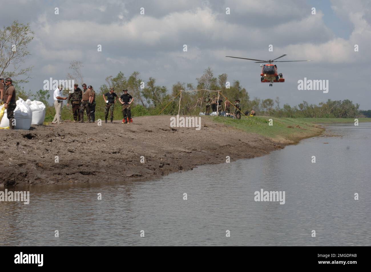 Aircrafts - Sand Baggers - 26-HK-57-46. HH-60 flying over waterfront ...