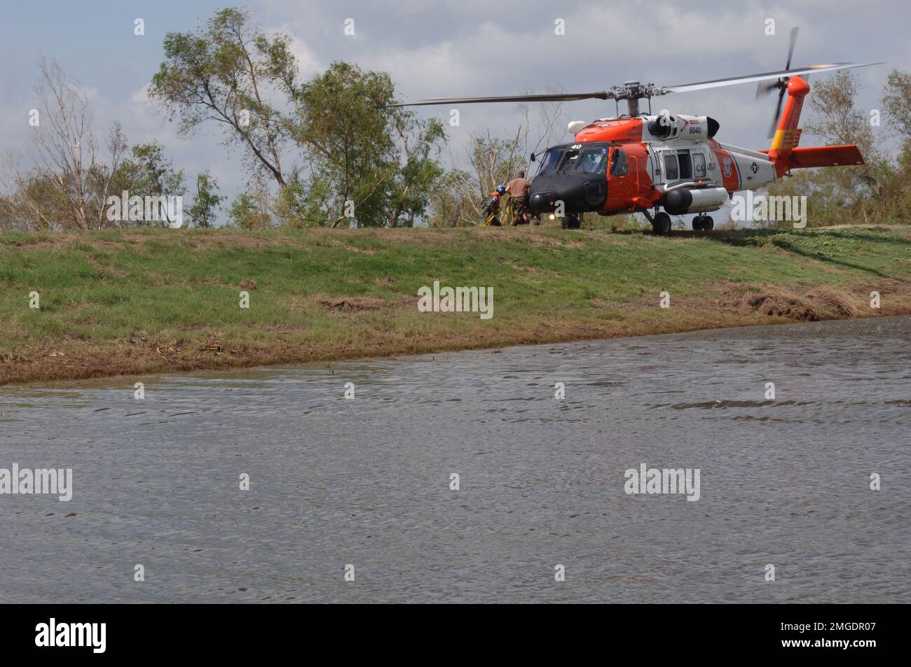 Aircrafts - Sand Baggers - 26-HK-57-63. HH-60 on waterfront embankment ...