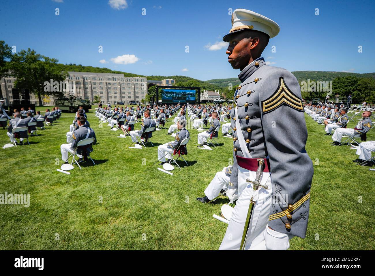 United States Military Academy graduating cadets queue to present ...